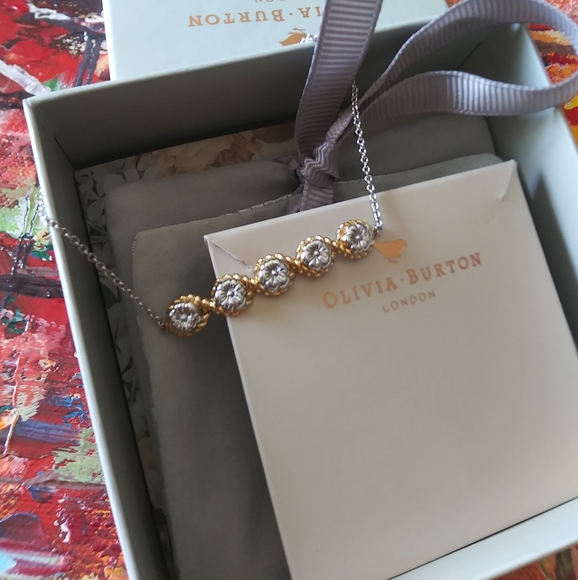 OLIVIA BURTON | Jewelry | Olivia Burton Floral Charms Bracelet Silver ...